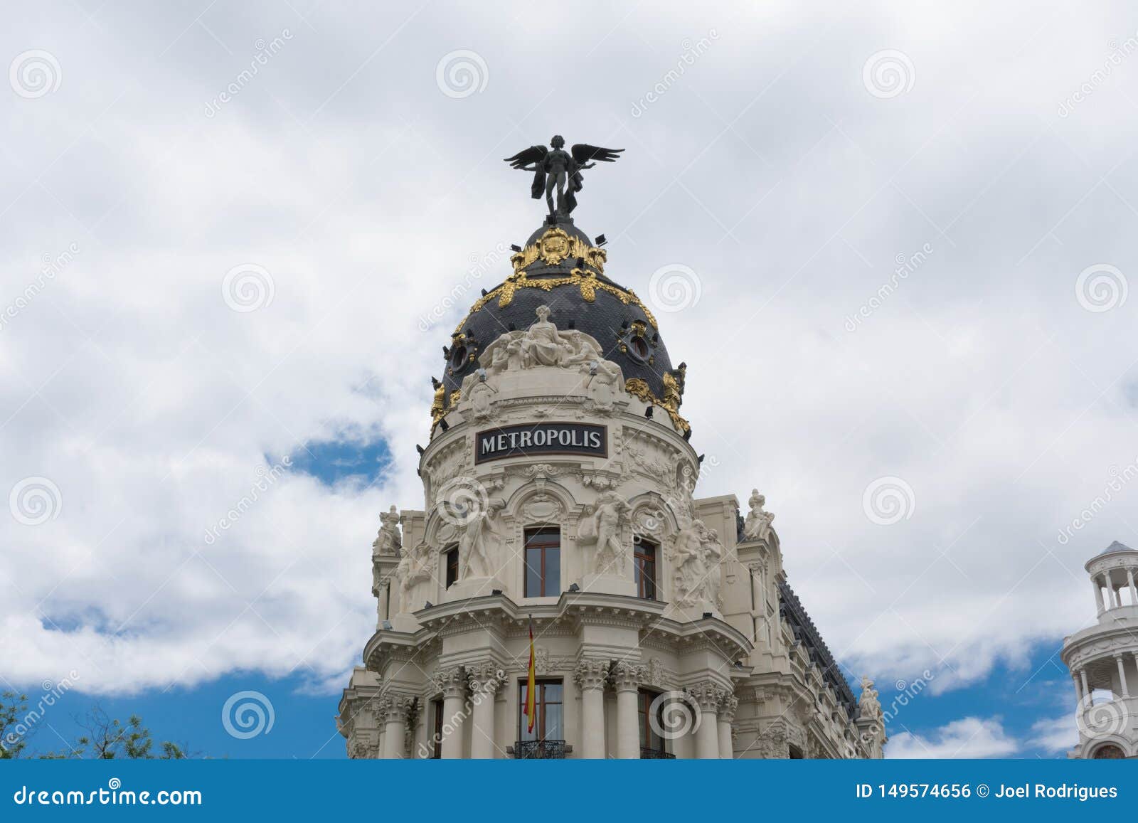 Domed Building with Angel Statue, Metropolis in Madrid Editorial Photo ...