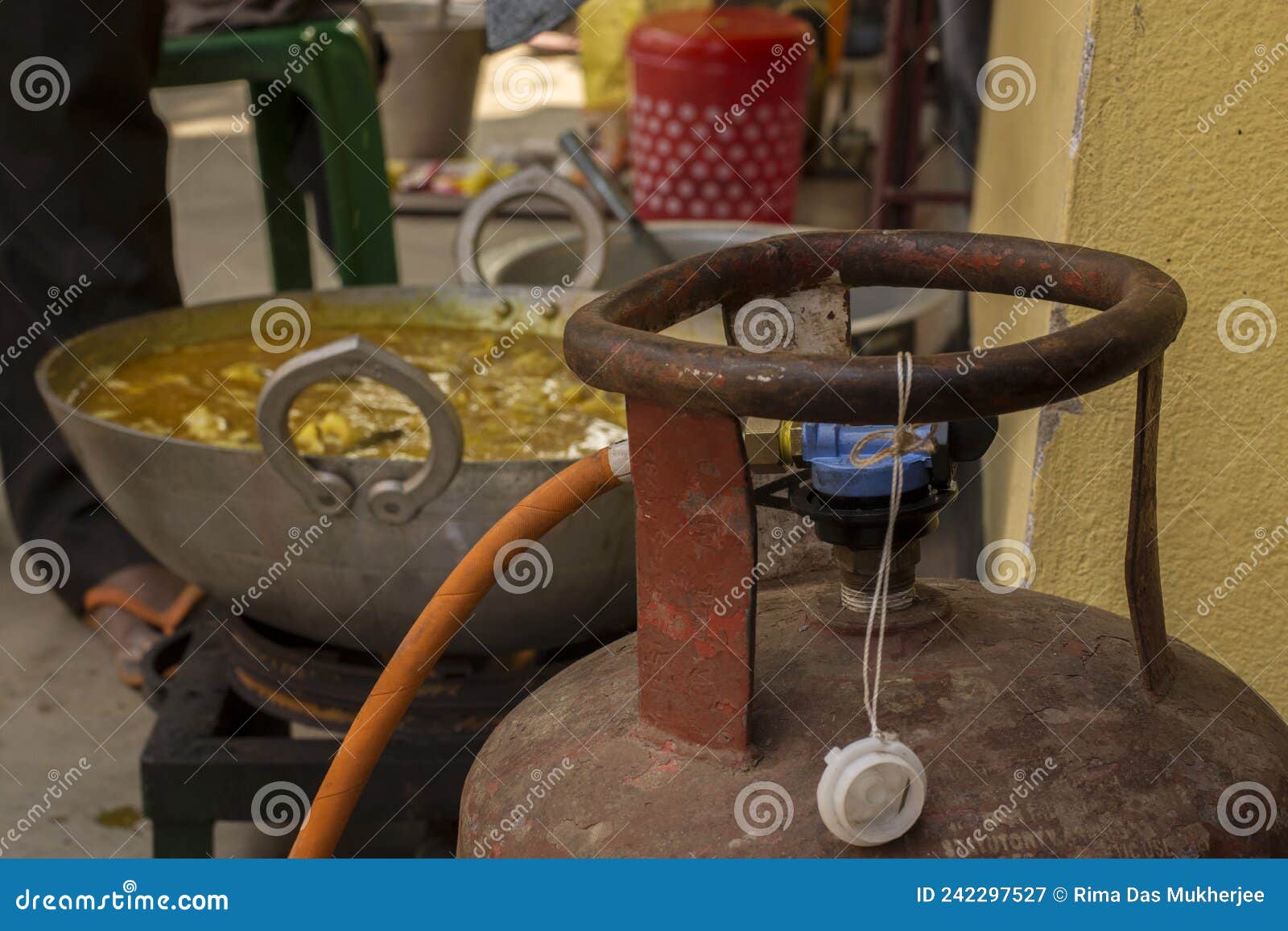 Domestic LPG Cylinder and Cooking at Background. Selective Focus ...