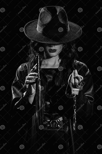 Dominant Woman With A Leather Whip Flogger And Handcuffs For Bdsm Sex With Submission And