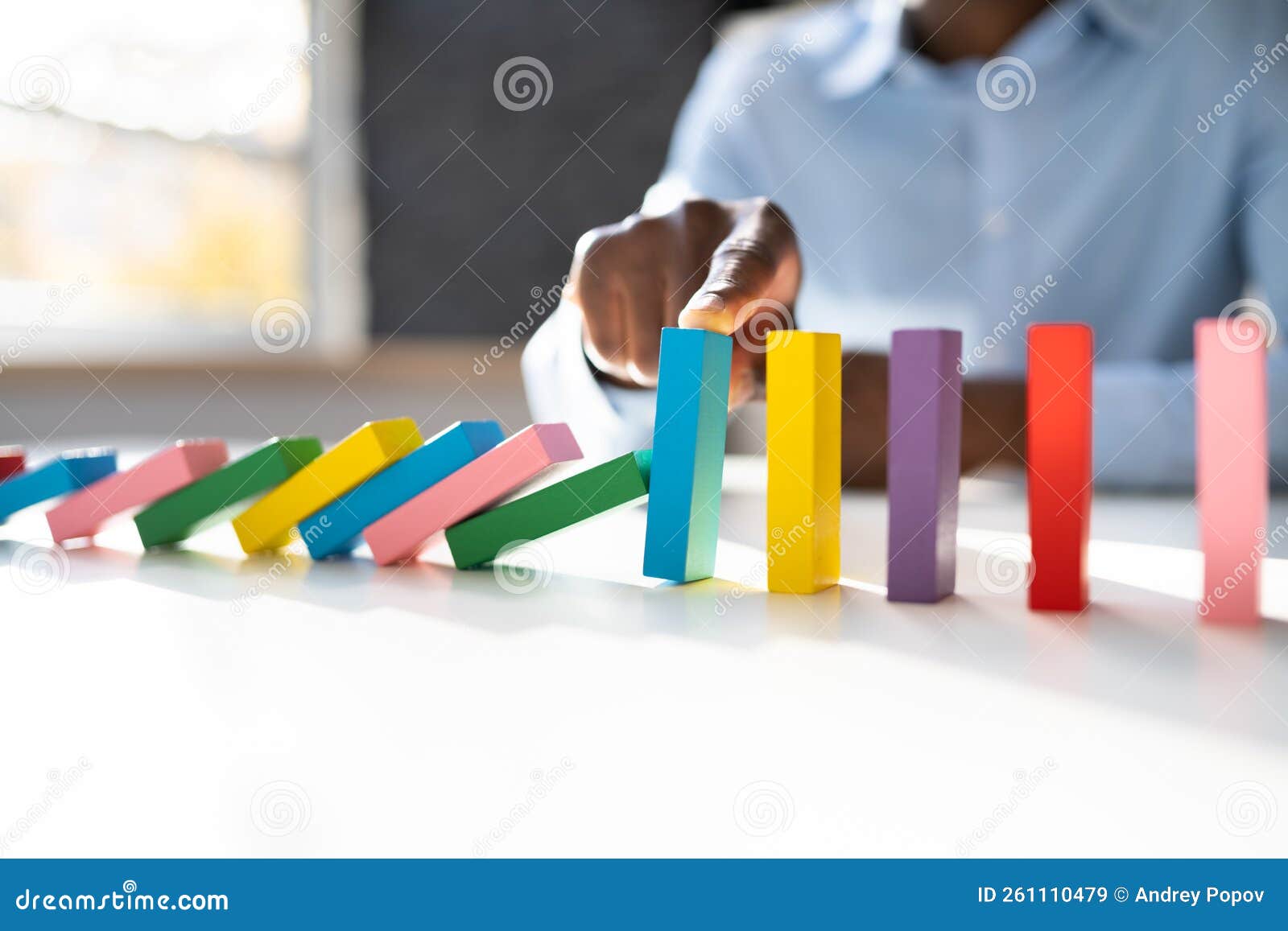 Domino Fall Prevention. Stop Falling Persons Stock Photo ...