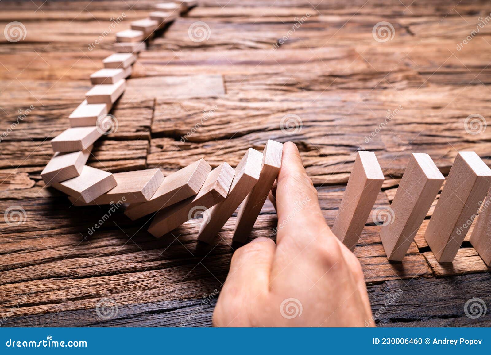 Domino Fall Prevention and Stop Stock Photo - Image of caucasian ...