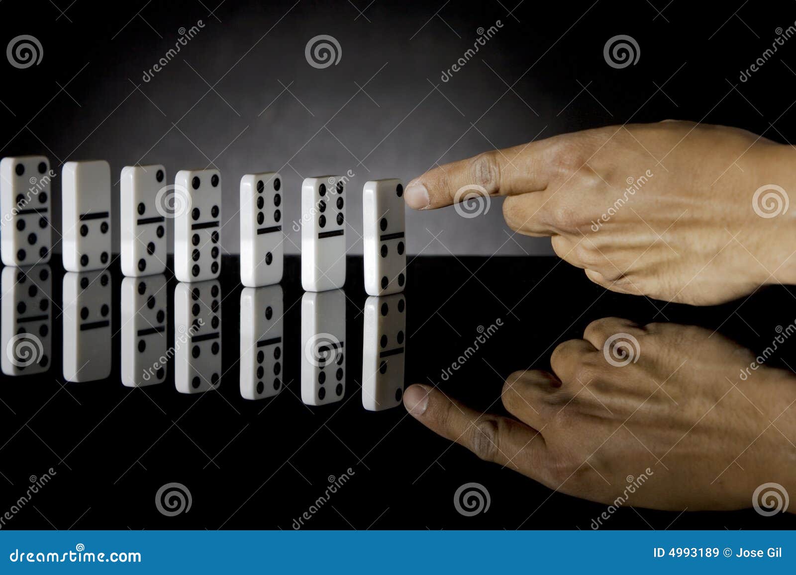 Domino Pushed 3 stock image. Image of white, hand, start - 4993189