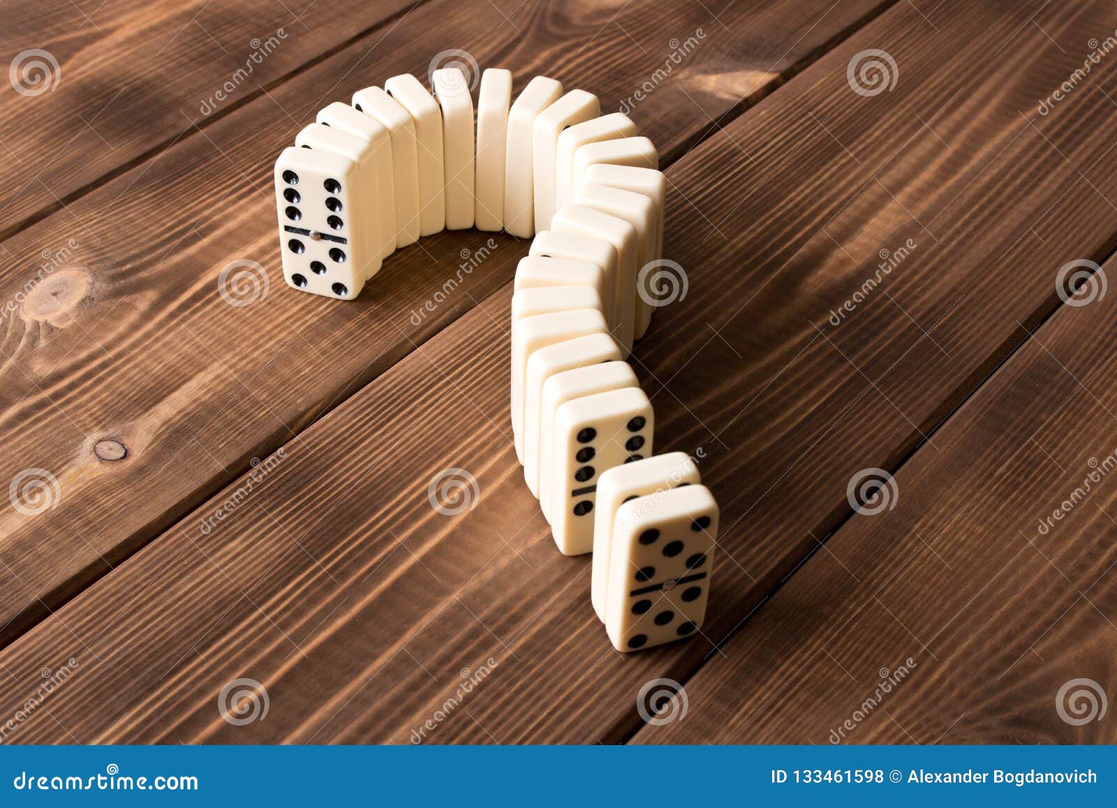 Domino Question Mark on Wooden Table. Domino Principle Stock Photo ...