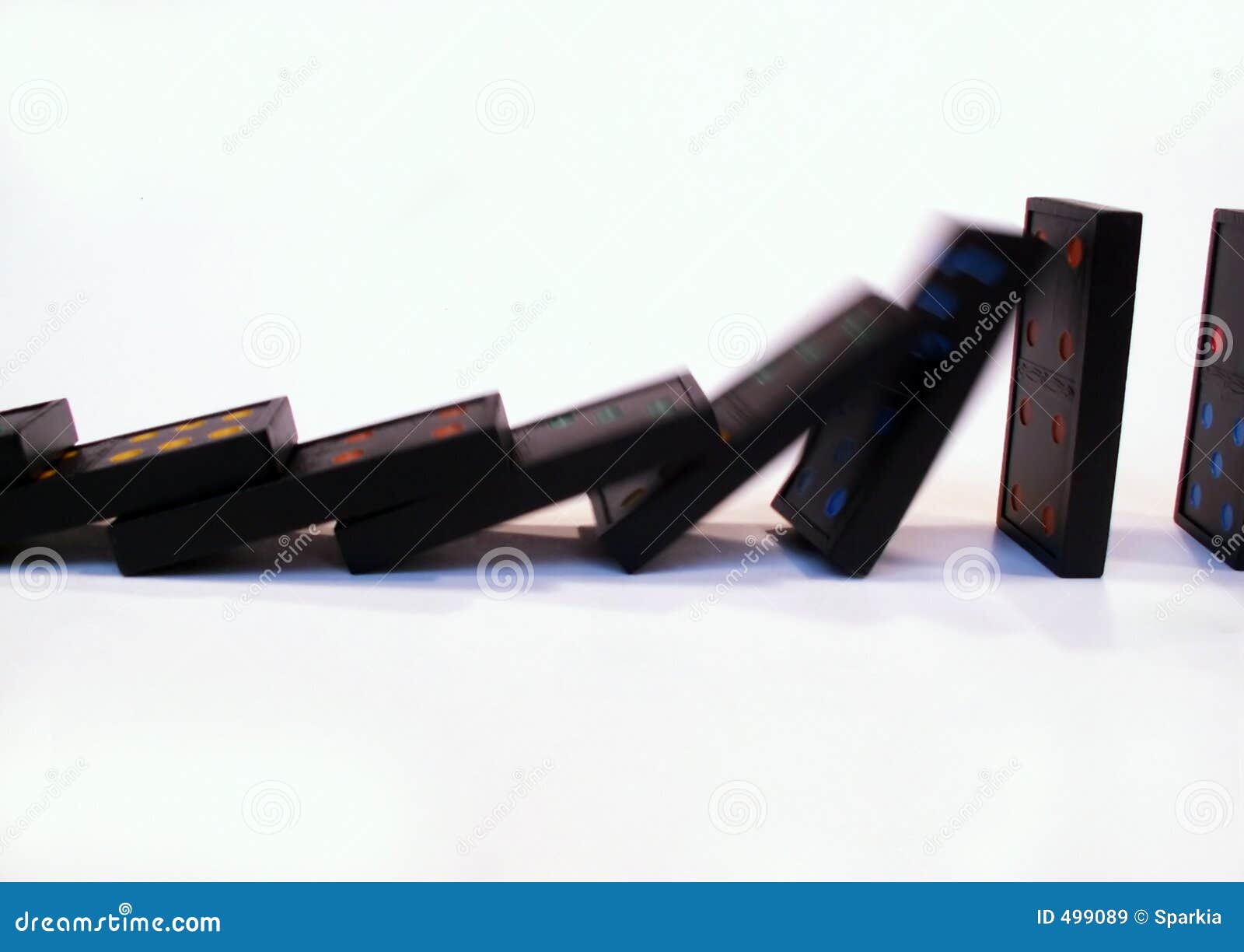 Dominoes falling stock image. Image of connected, balance - 499089