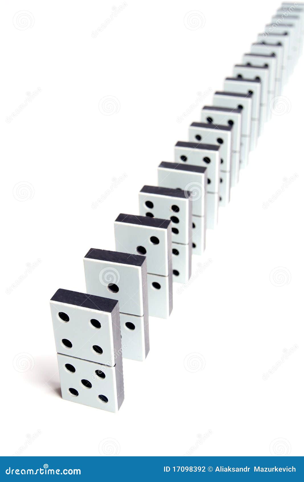 Dominoes in a line stock photo. Image of chain, accident - 17098392