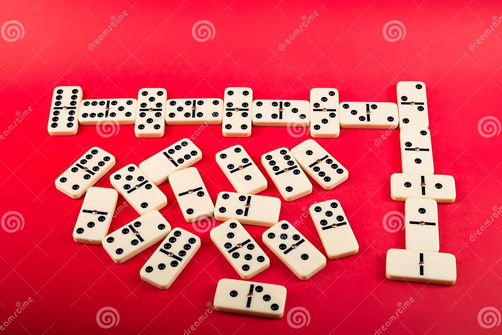 Dominoes with Red Background, Copy Space and Various Angles Stock Photo ...