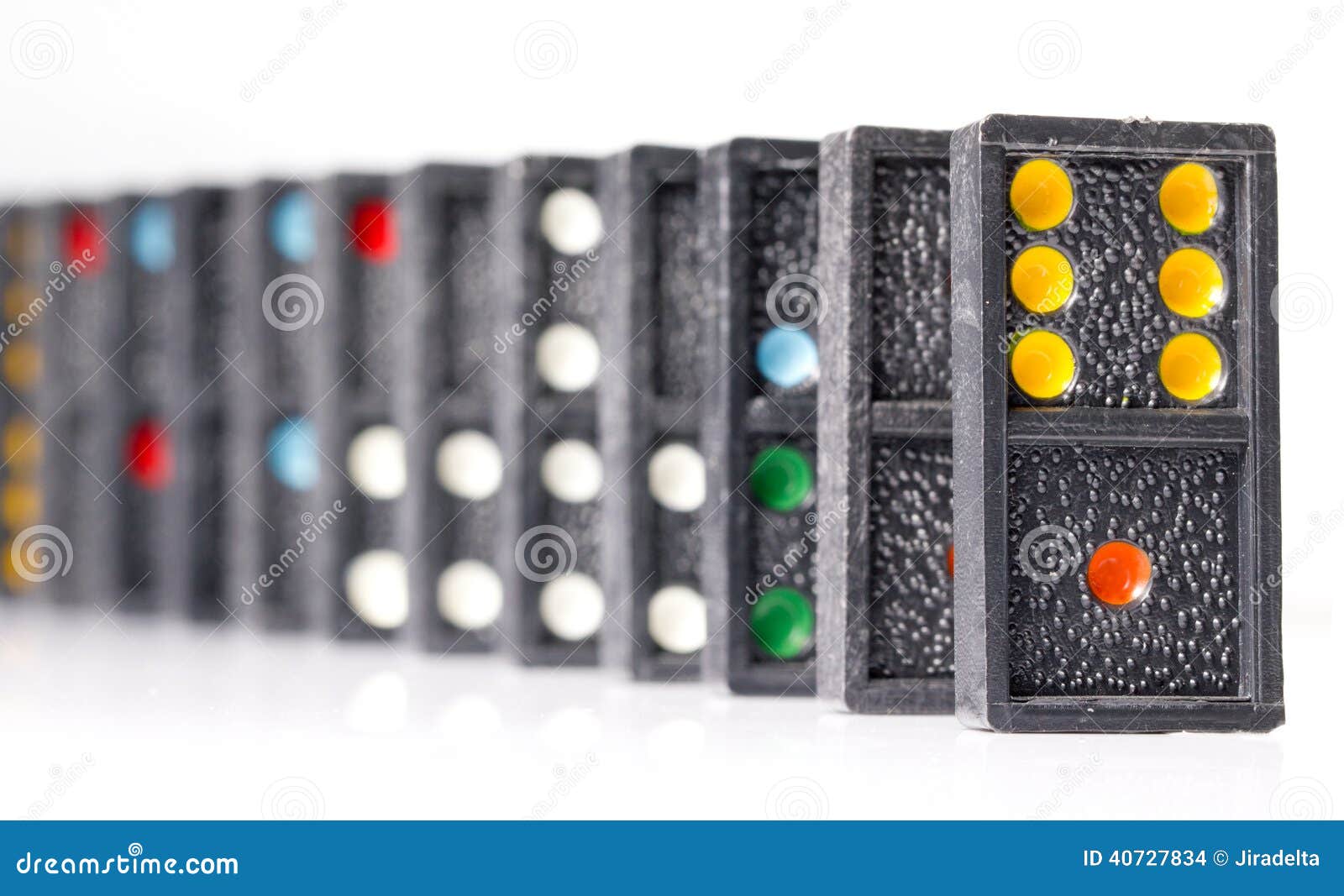 Line Of Dominos With One Standing Out From The Line. Royalty-Free Stock ...