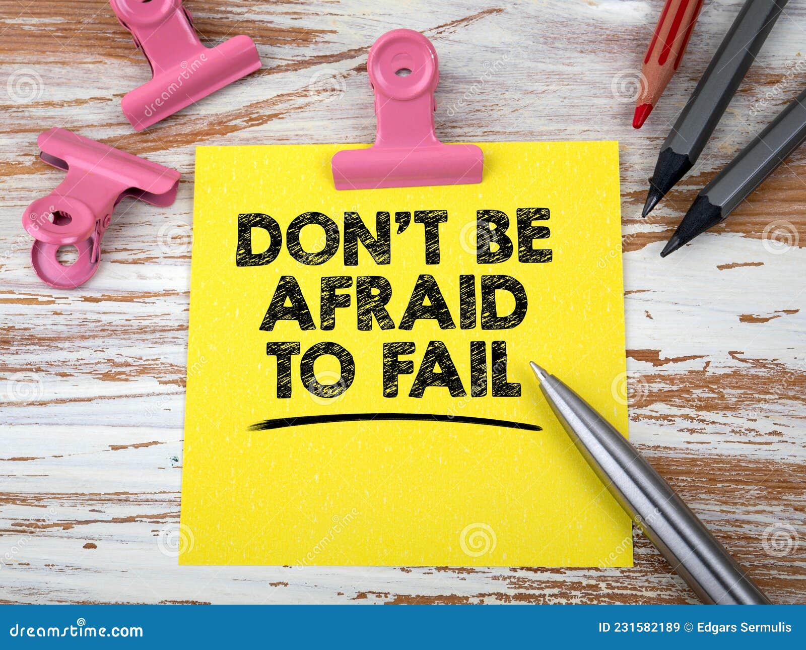 Don T Be Afraid To Fail. Notepad and Office Supplies on a Wooden Table ...
