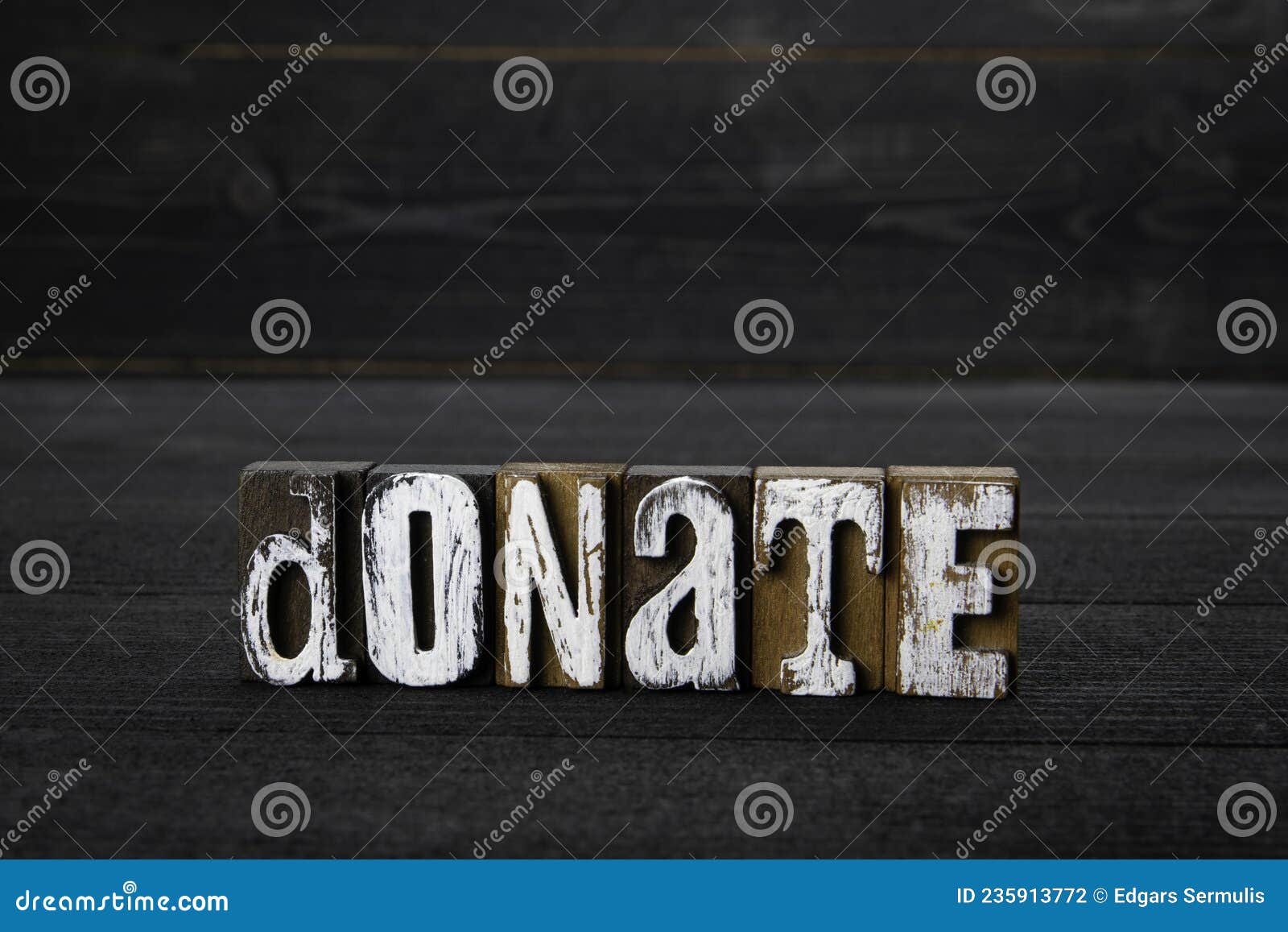 Donate. Alphabet Letters on Black Painted Wood Stock Photo - Image of ...