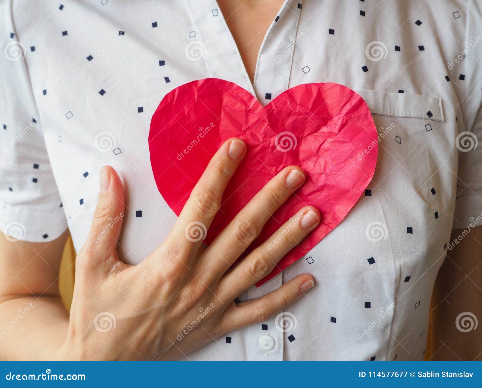 Donated Heart. Large and Small Red Heart in His Hand. Stock Image ...