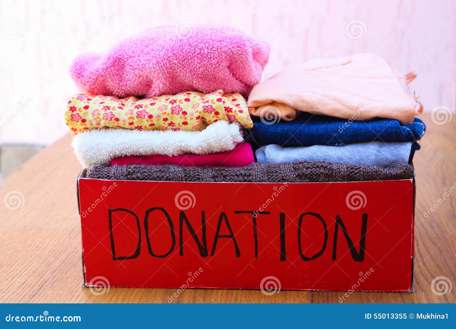 Donation Box with Clothes. a Box of Warm Clothes. Stock Image - Image ...