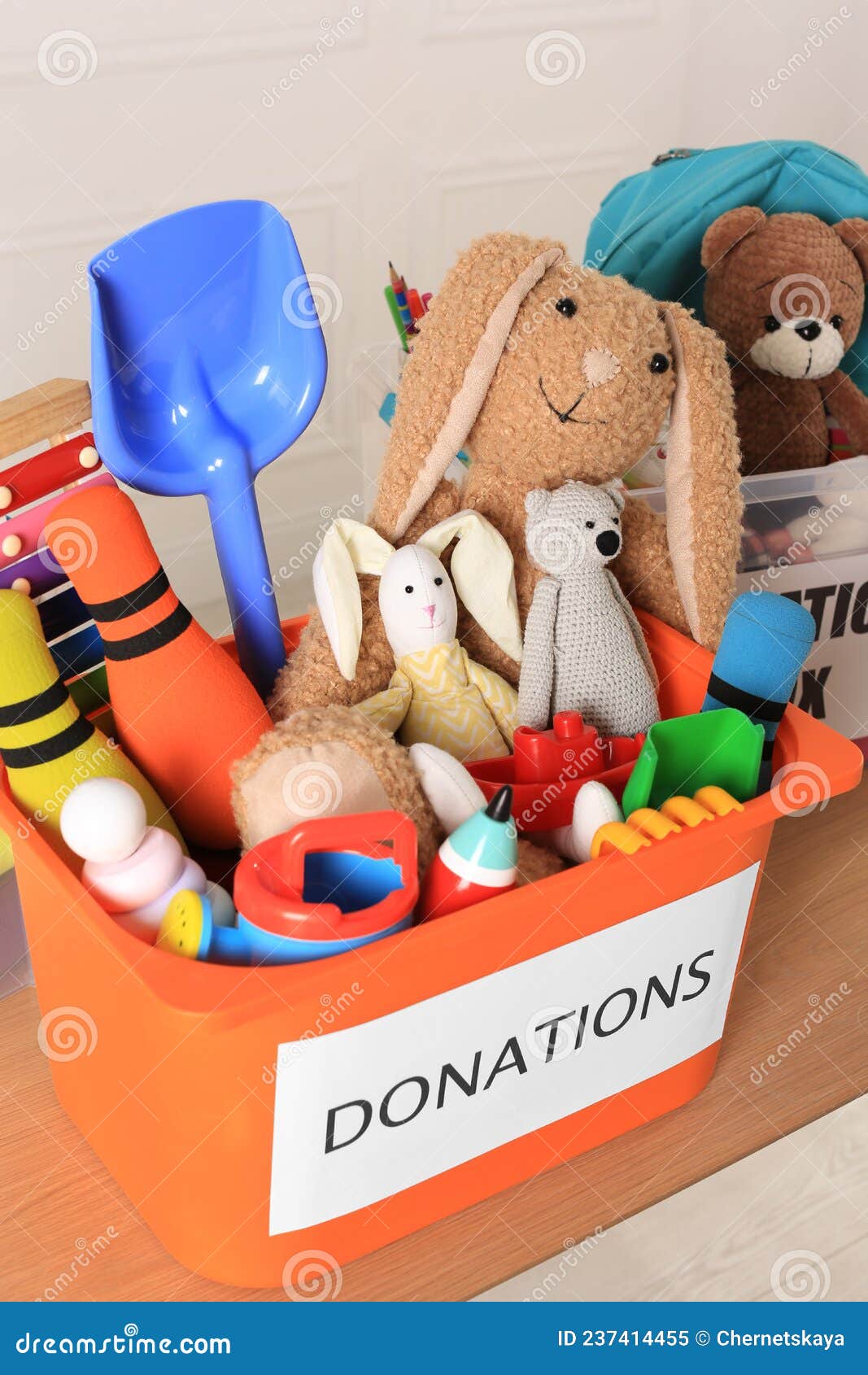 Donation Box with Different Child Toys on Wooden Table Stock Image ...