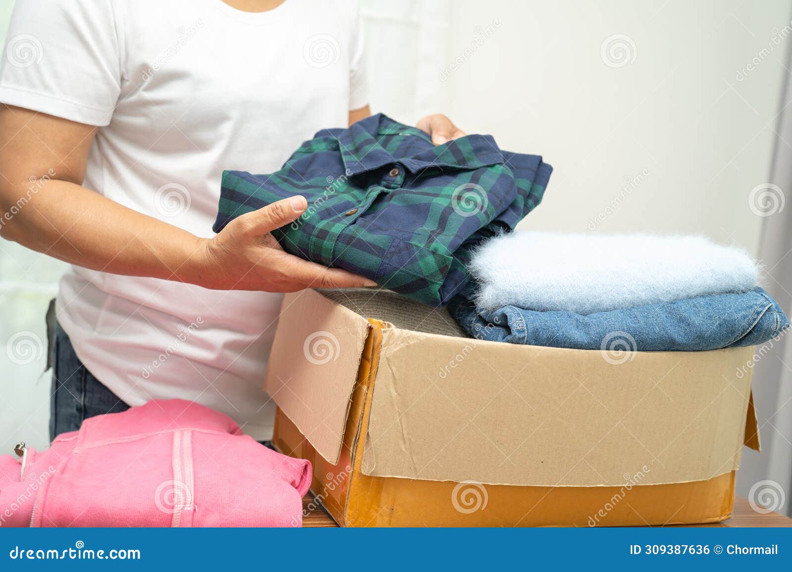 Donation Box with Used Clothes at Home To Support Help for Poor People ...