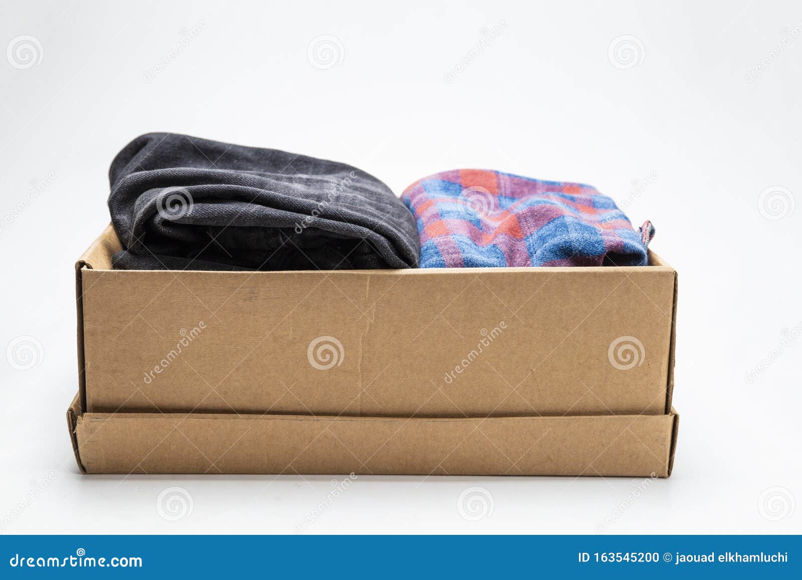 Donation Concept. Box with Donation Clothes on a White Background Stock ...