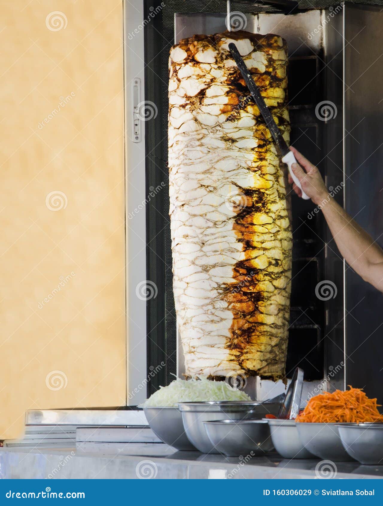 Doner Kebab on Rotating Vertical Spit in the East Stock Image - Image ...