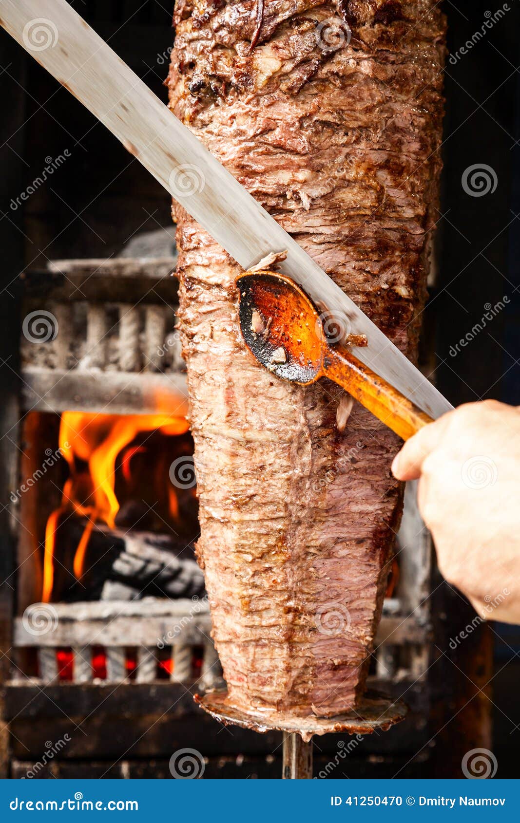 Doner Meat Being Sliced from Rotating Spit Stock Photo - Image of ...