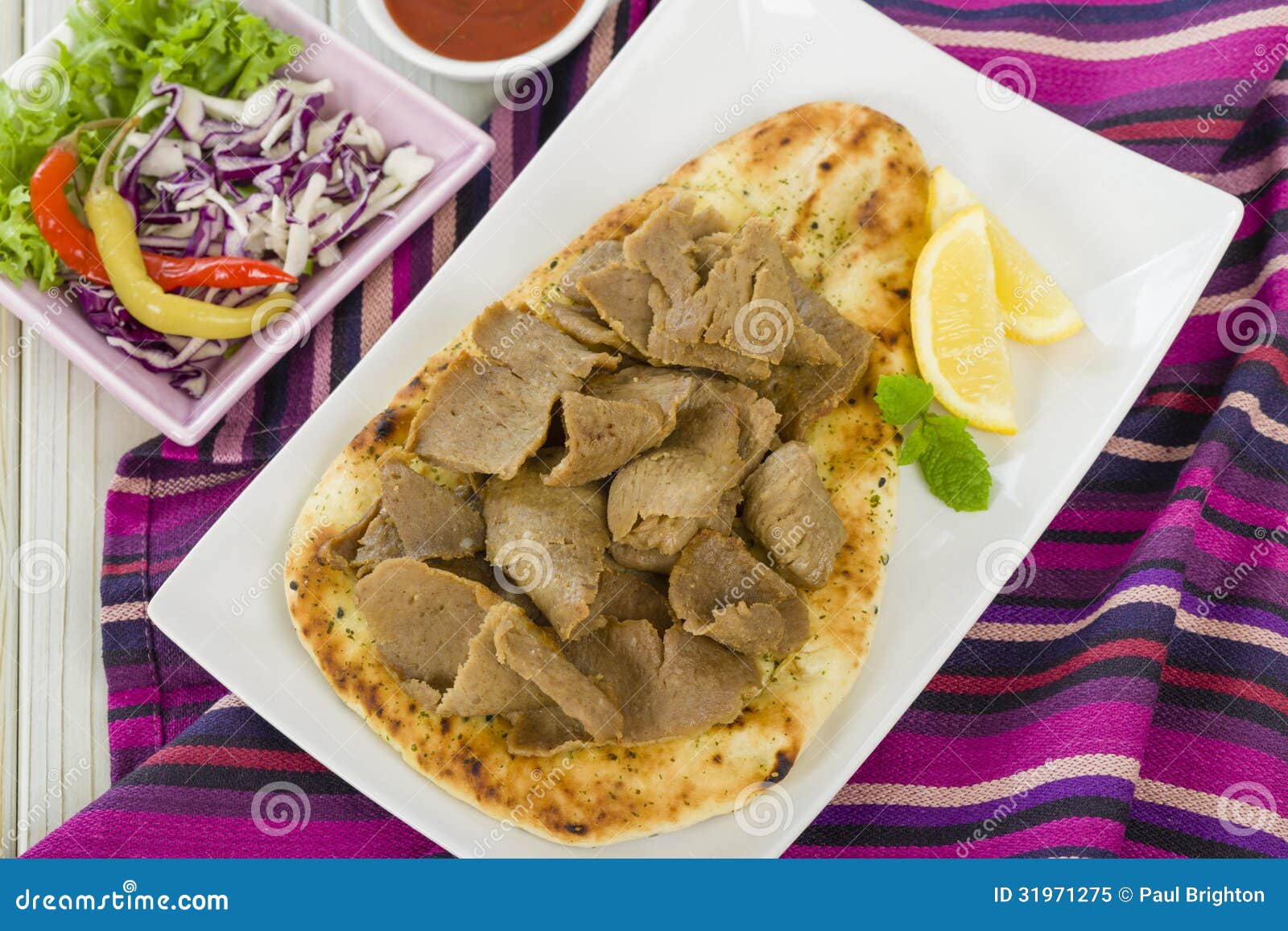 Donner Meat on Naan stock image. Image of sauce, purple - 31971275