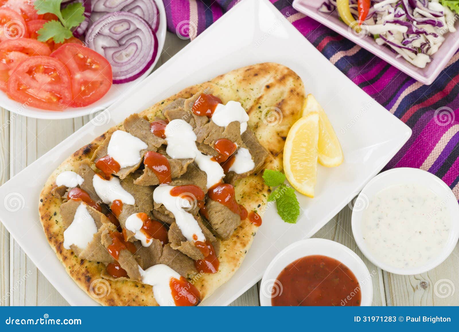 Donner Meat on Naan stock image. Image of salad, chili - 31971283