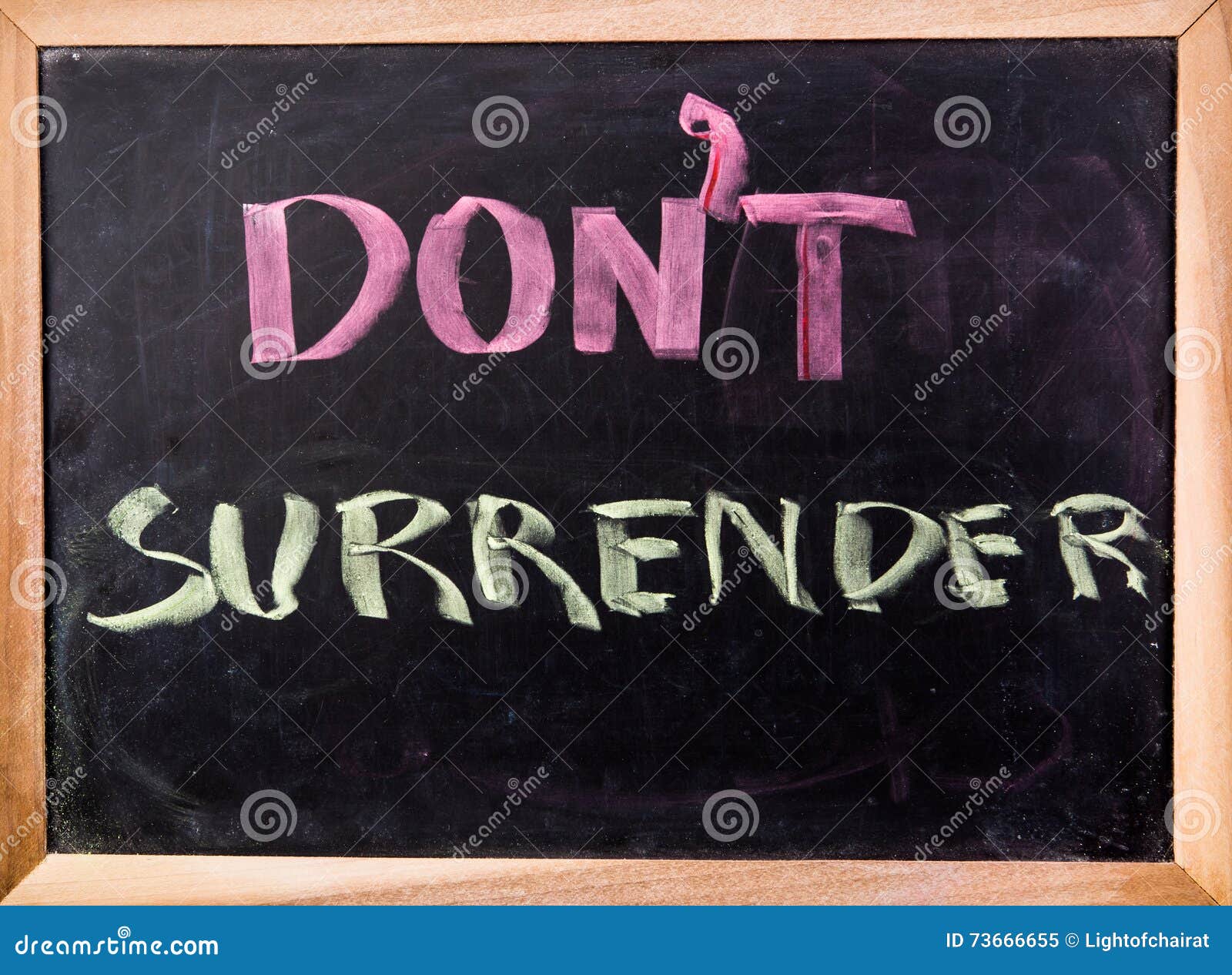 Dont Surrender Word on Blackboard Stock Image - Image of texture, hand ...