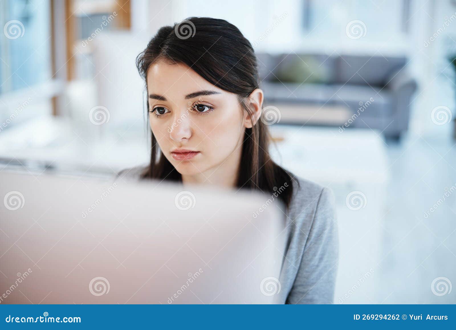 Dont Wait for it, Work for it. a Young Businesswoman Using a Computer ...