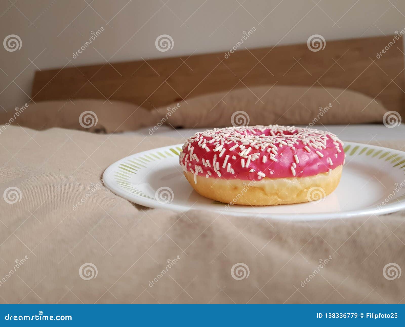 Donut in bed stock image. Image of crop, plate, cushions - 138336779