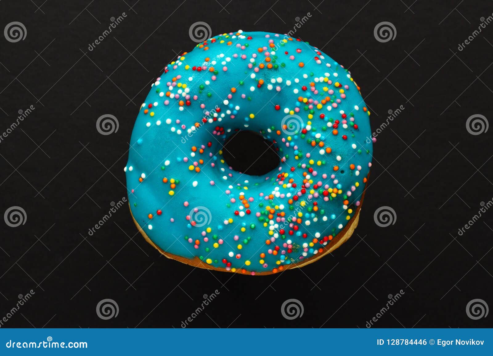 Donut Blue with Sprinkles Isolated on Black Background, Close-up Stock ...