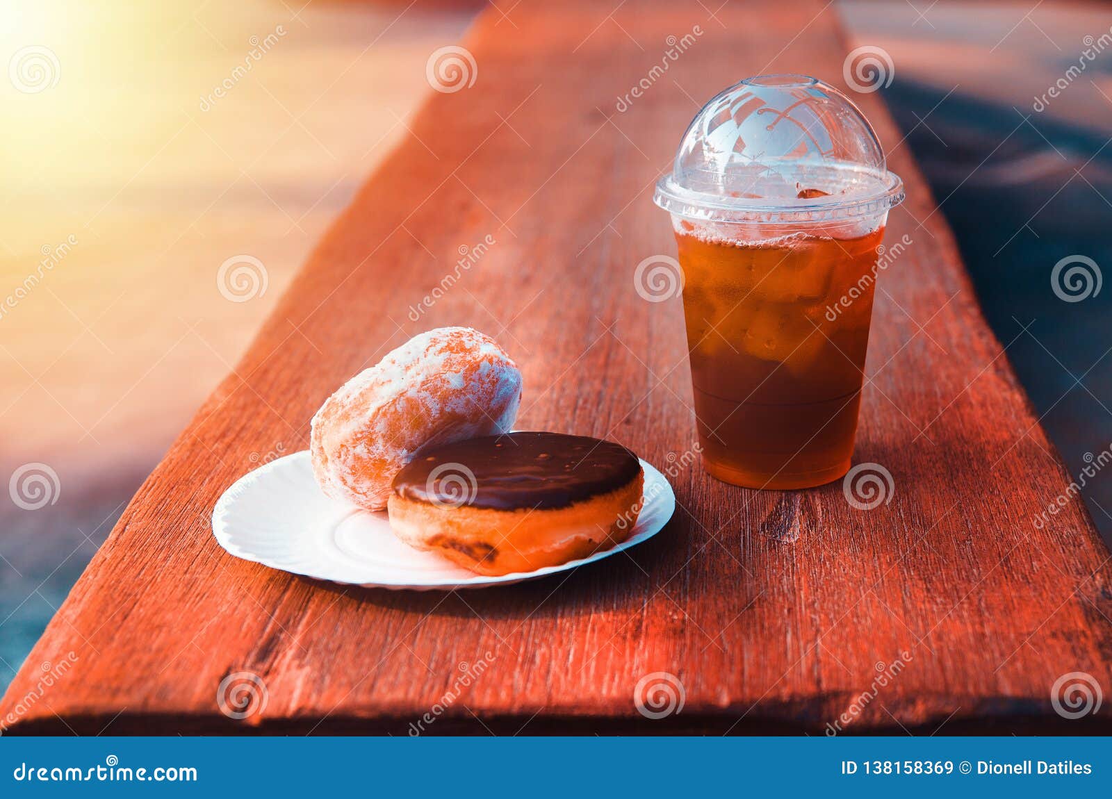 Donut and iced tea stock image. Image of doughnuts, baked - 138158369