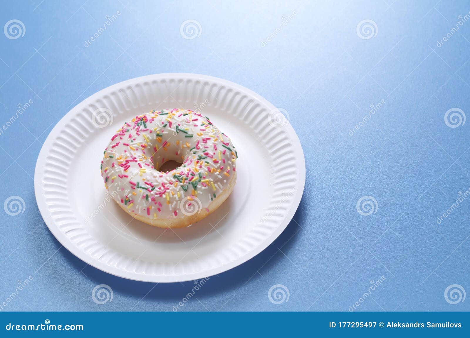Donut on paper plate stock image. Image of paper, frosting - 177295497