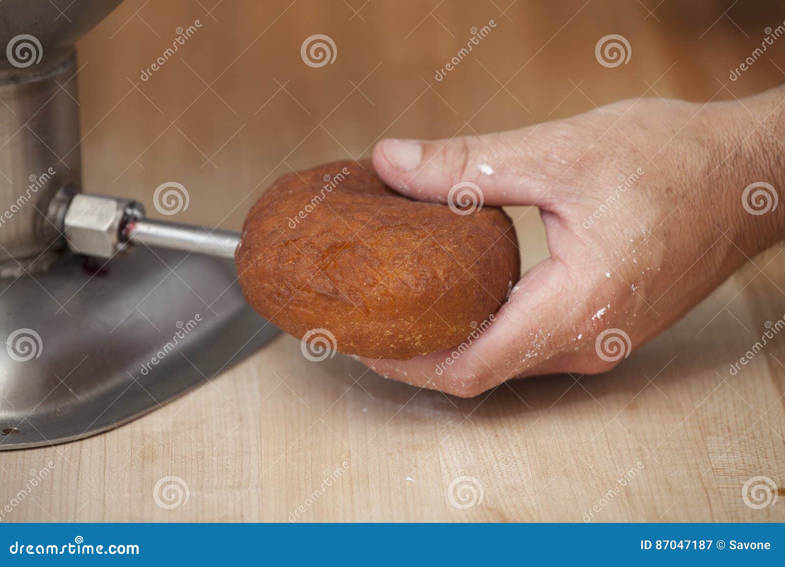 A Donut Shell Being Filled with Jelly Stock Image - Image of buns ...