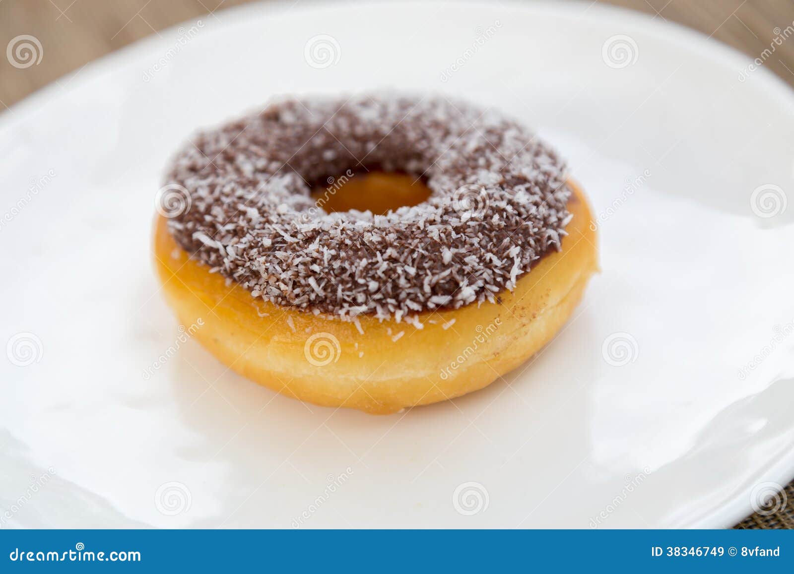 Donut on a white plate stock image. Image of detail, white - 38346749