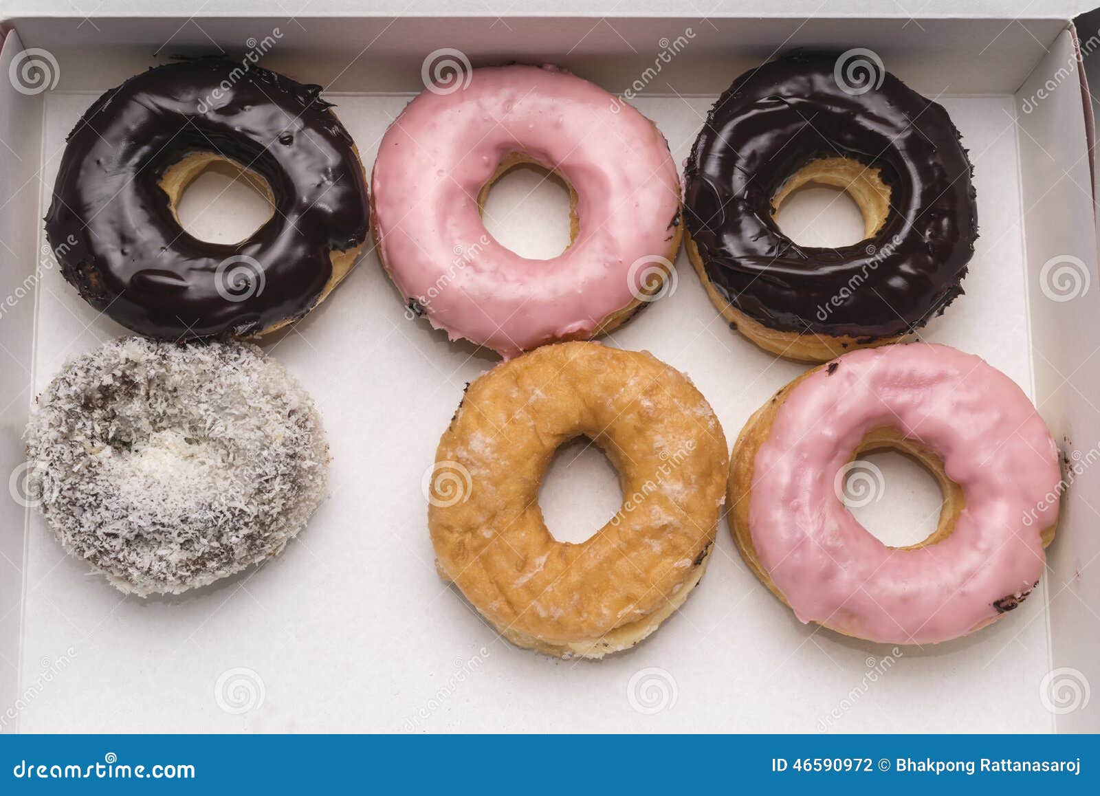 Donuts in a box stock photo. Image of bakery, brown, sprinkles - 46590972