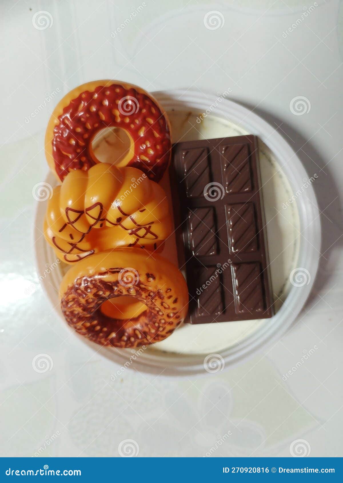 Donuts and Chocolate Bars are a Delicious Array of Toys Stock Photo ...