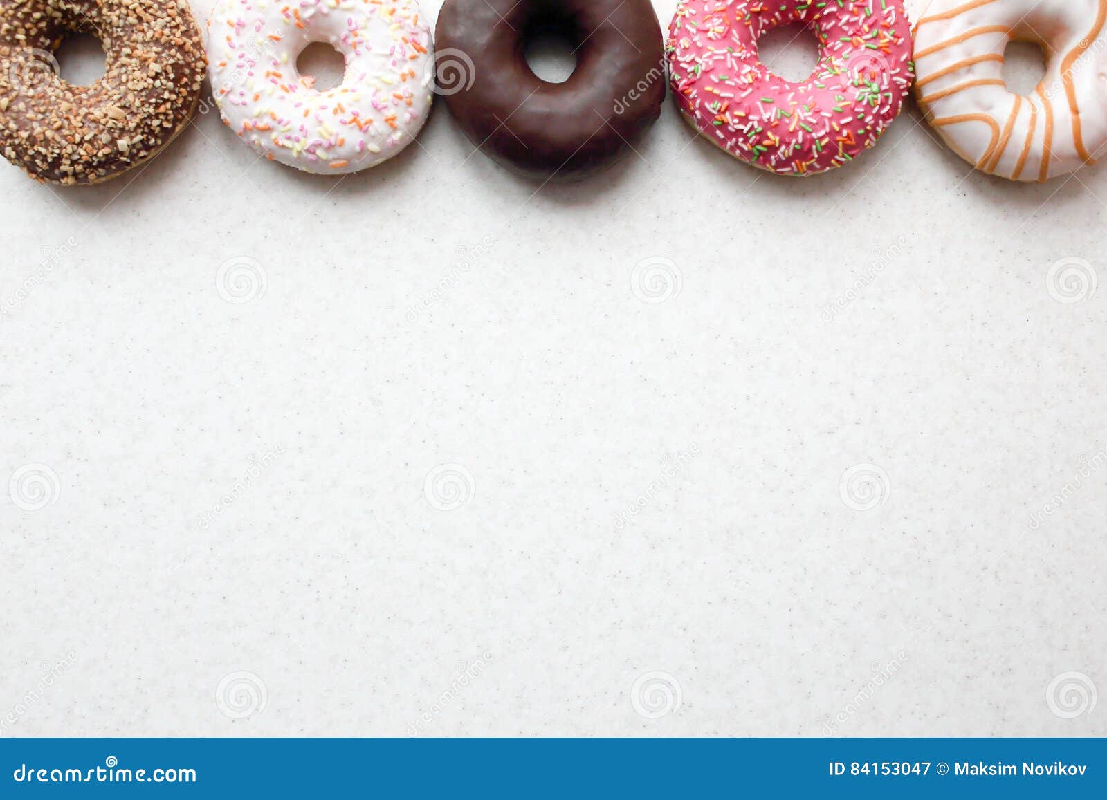 Donuts in Color Glaze on a Light Background. Stock Image - Image of ...