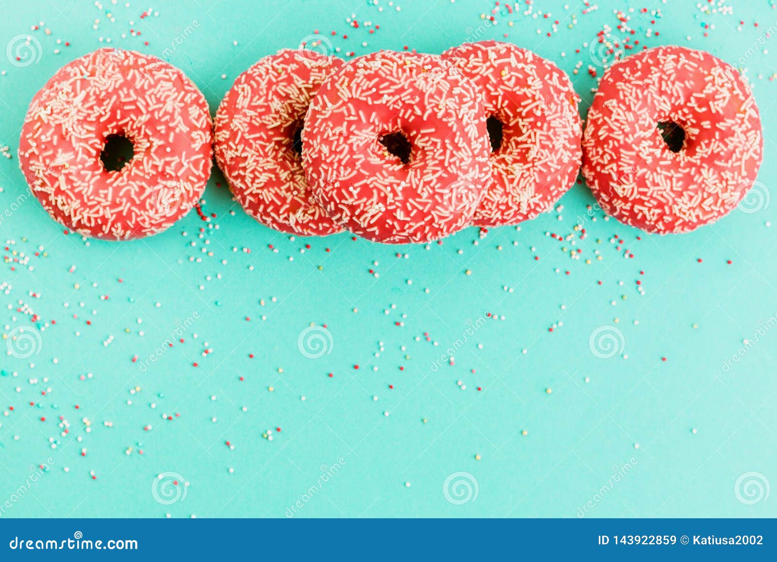 Donuts Decorated with Icing on Blue Background Stock Image - Image of ...