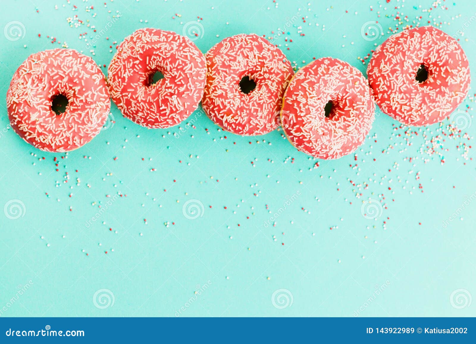 Donuts Decorated with Icing on Blue Background Stock Image - Image of ...