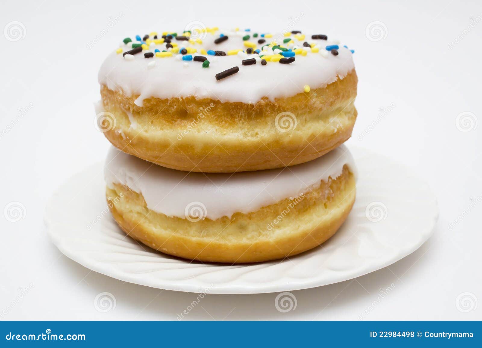 Donuts on plate stock photo. Image of sprinkles, dessert - 22984498