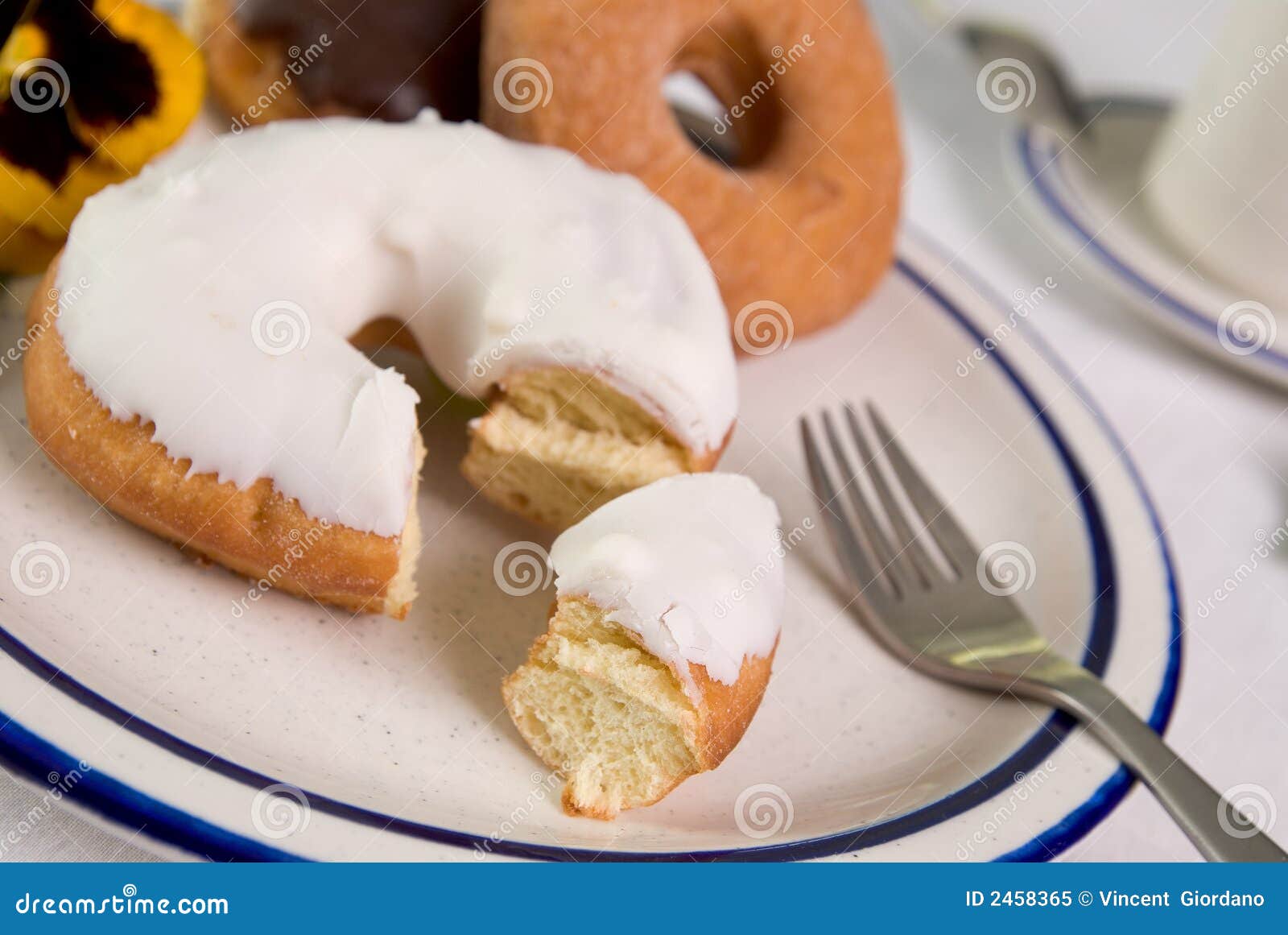 Donuts on plate up close stock image. Image of frosting - 2458365