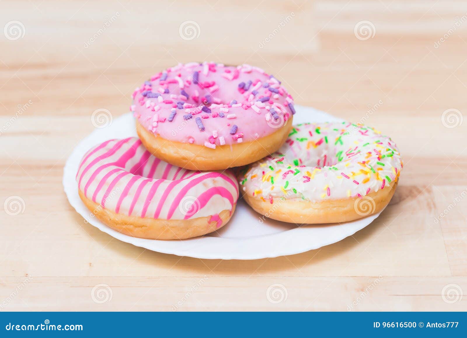 Donuts on a plate stock photo. Image of cooking, sweet - 96616500