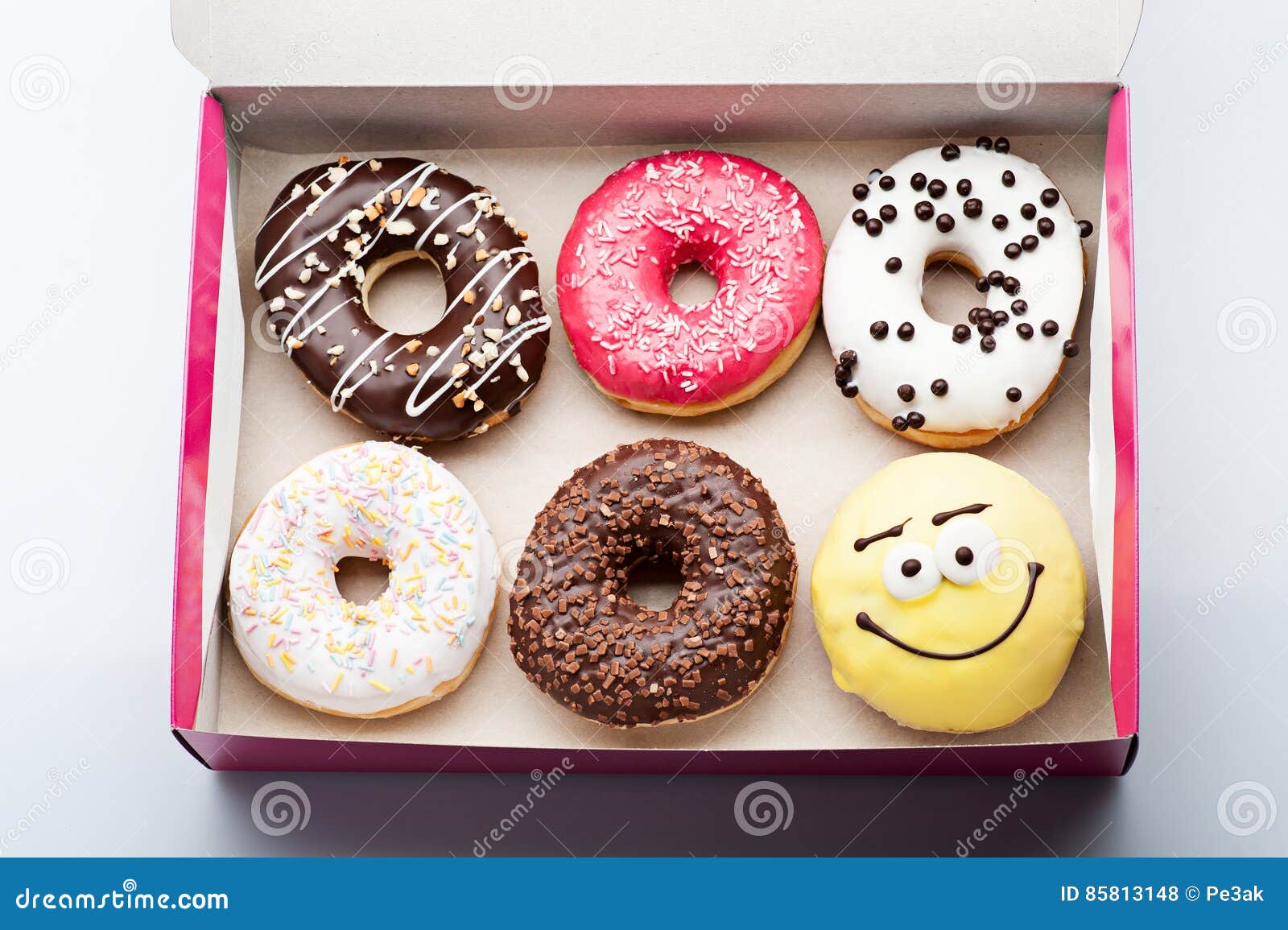Donuts set in box on white stock photo. Image of chocolate - 85813148