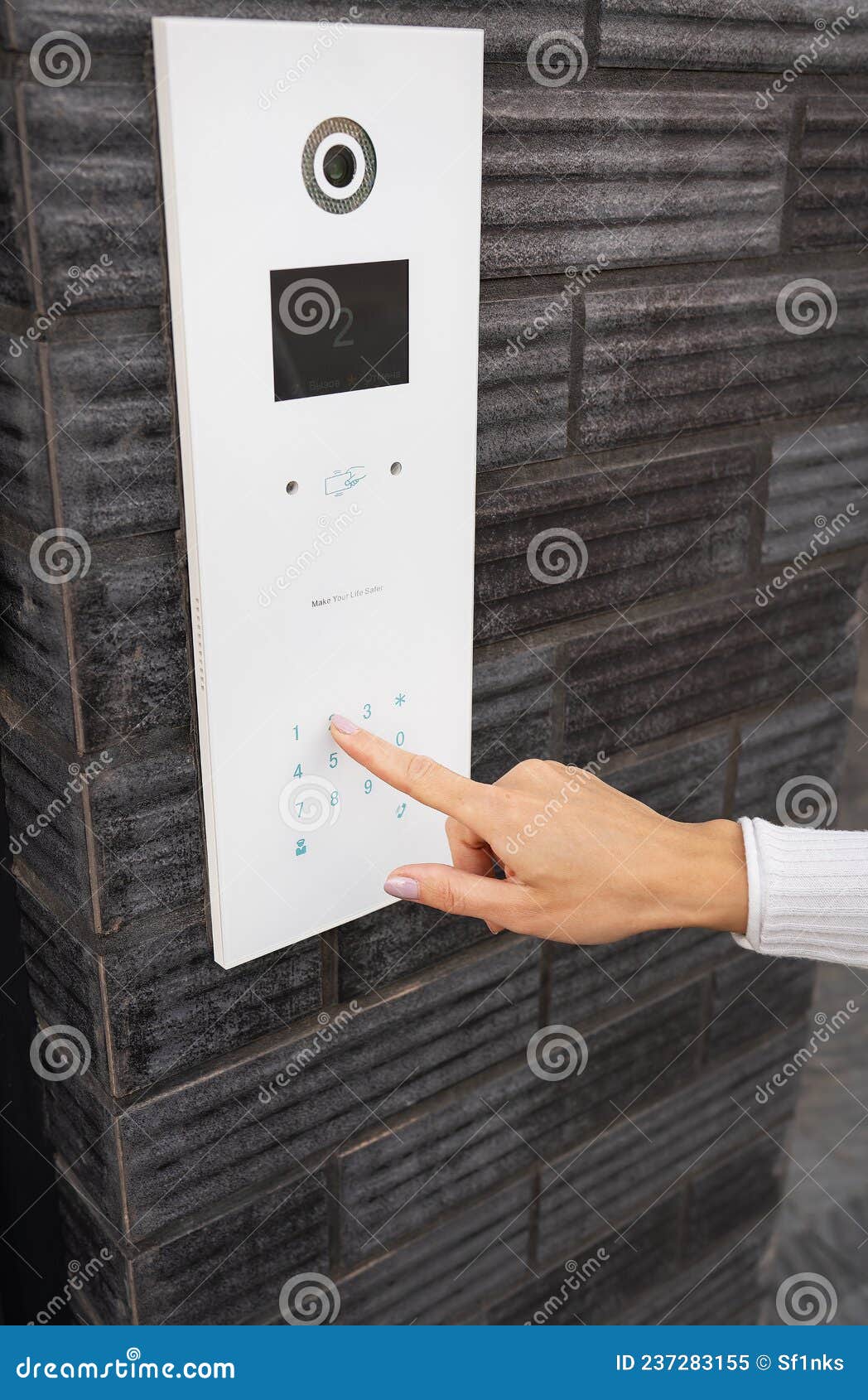 Door Access Control - a Young Woman Enters a Code To Open the Door ...