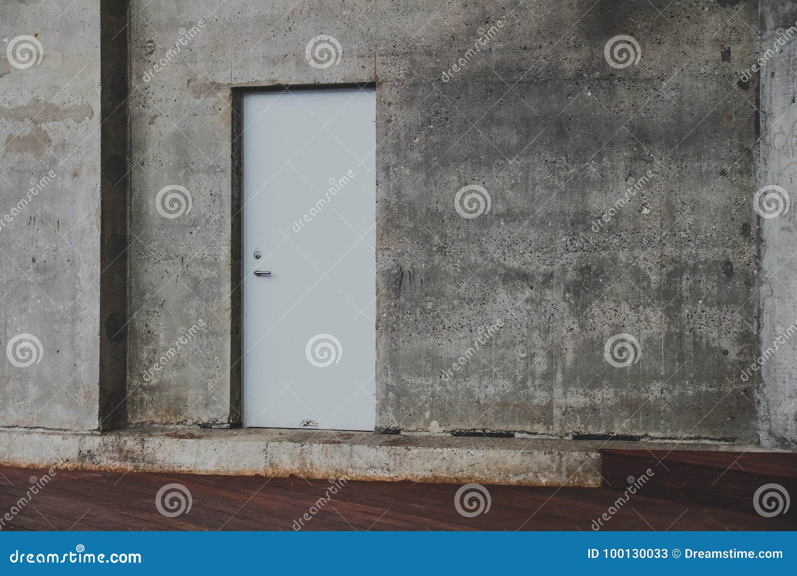Door on the Background of a Concrete Texture Wall Stock Image - Image ...