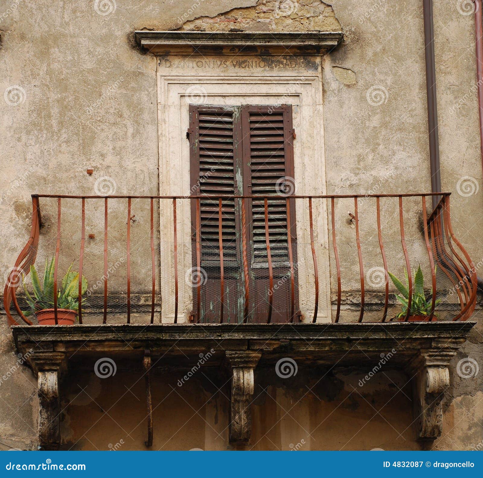 Door with Balcony in Tuscany Stock Image - Image of inscribe, slat: 4832087