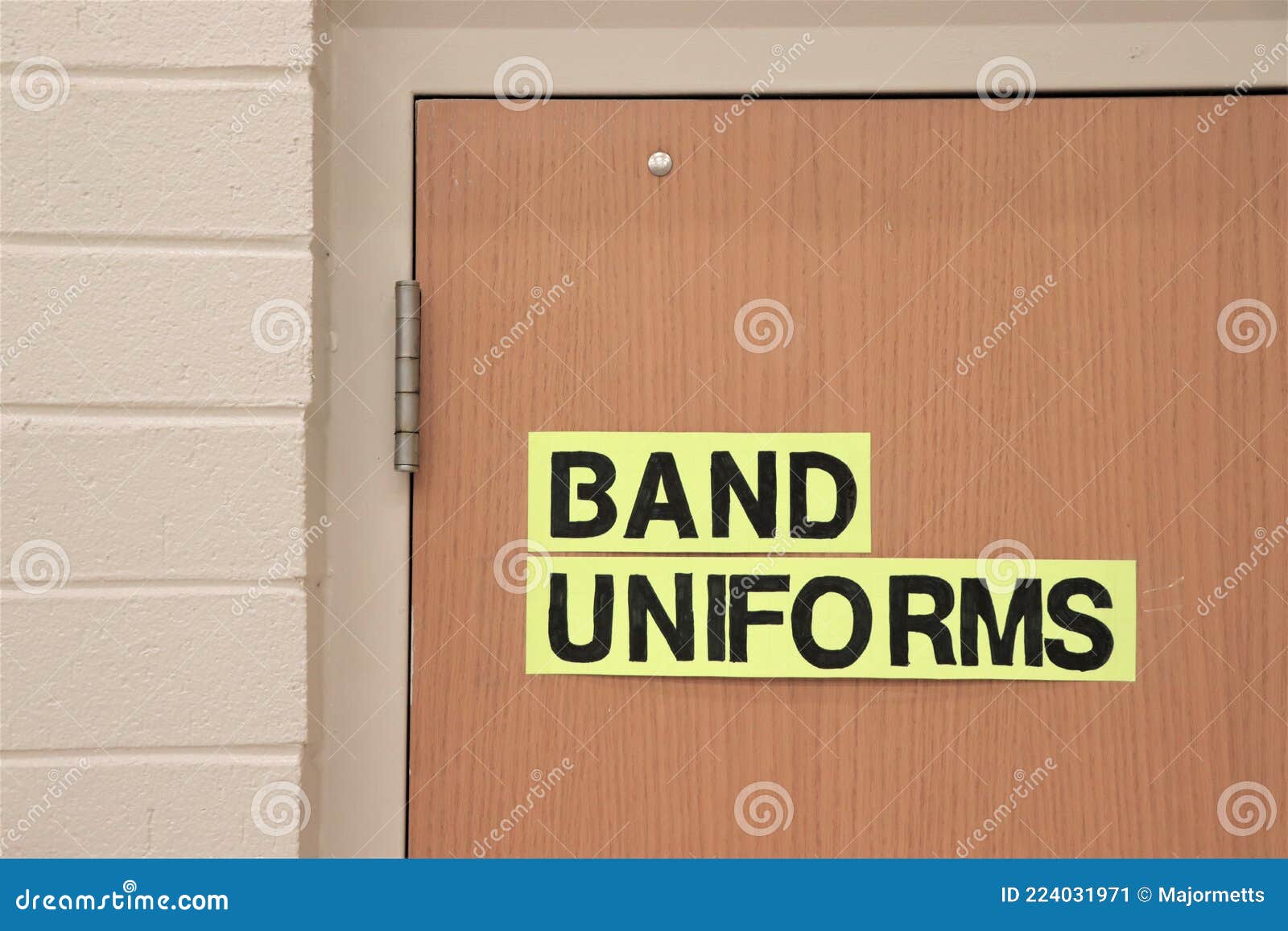 Door with Band Uniforms Sign Stock Image - Image of black, door: 224031971