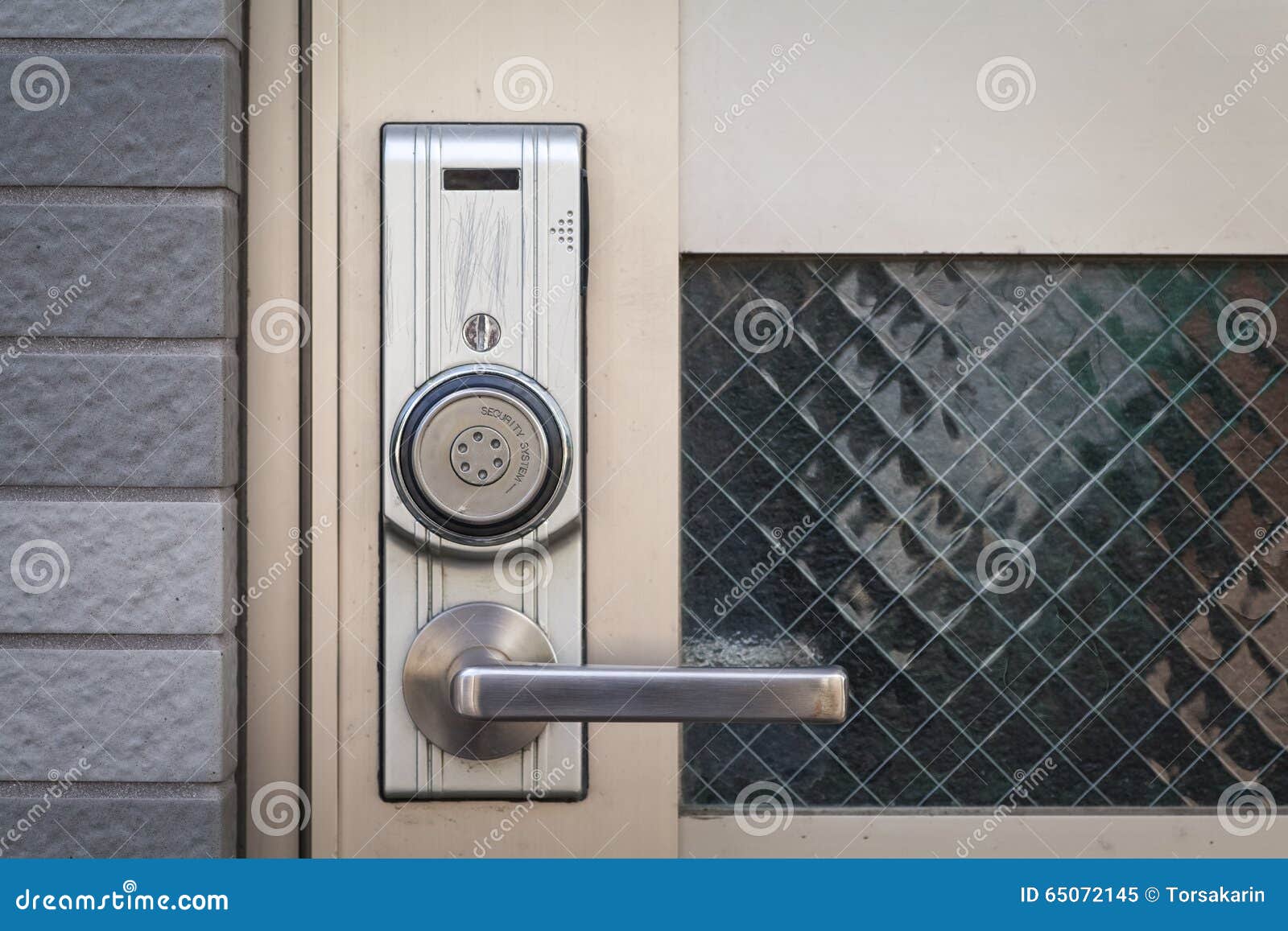 Door Handle with Security System Lock on Metal Door Stock Image - Image ...