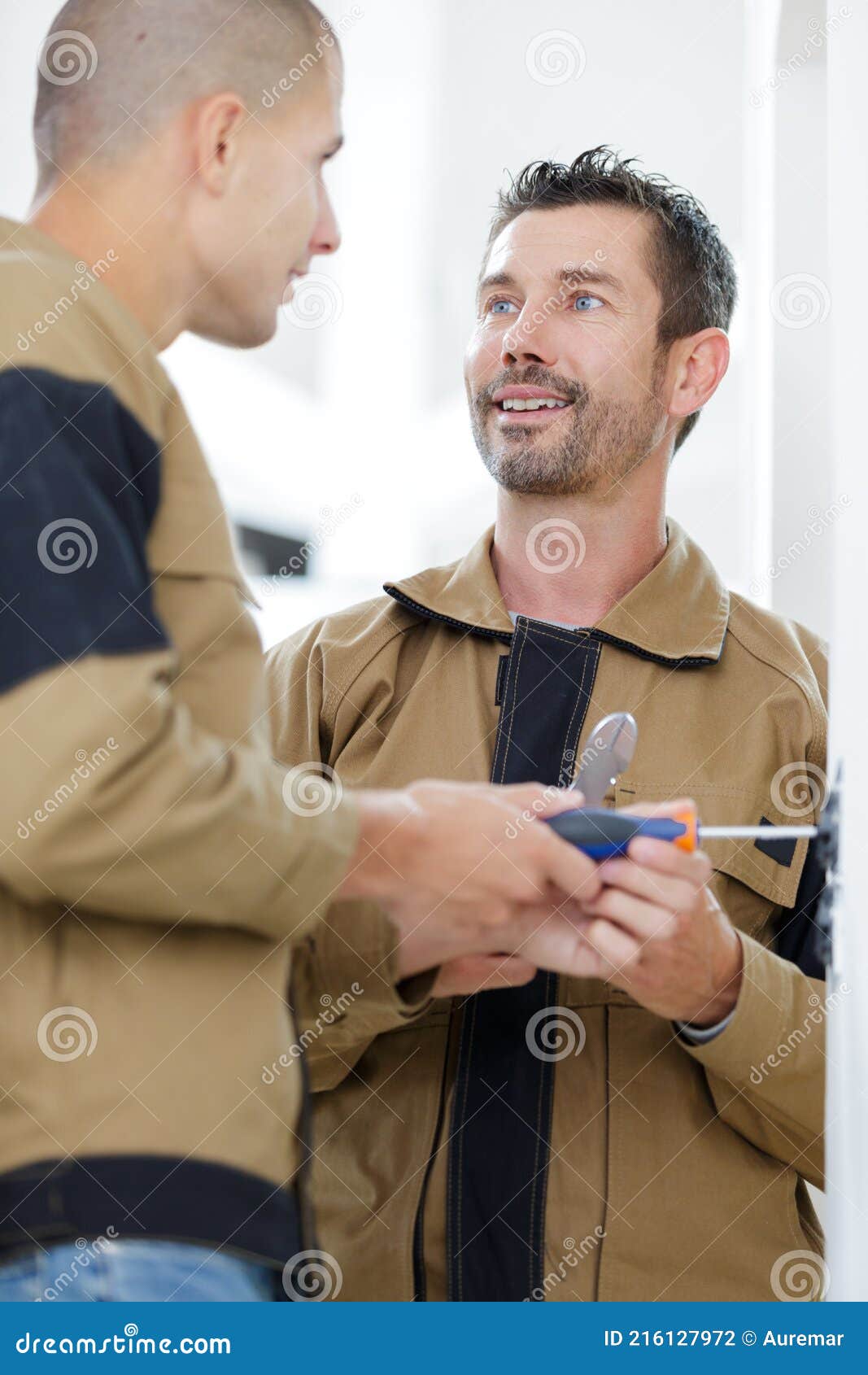 Door Installation Workers Together Stock Photo - Image of professional ...