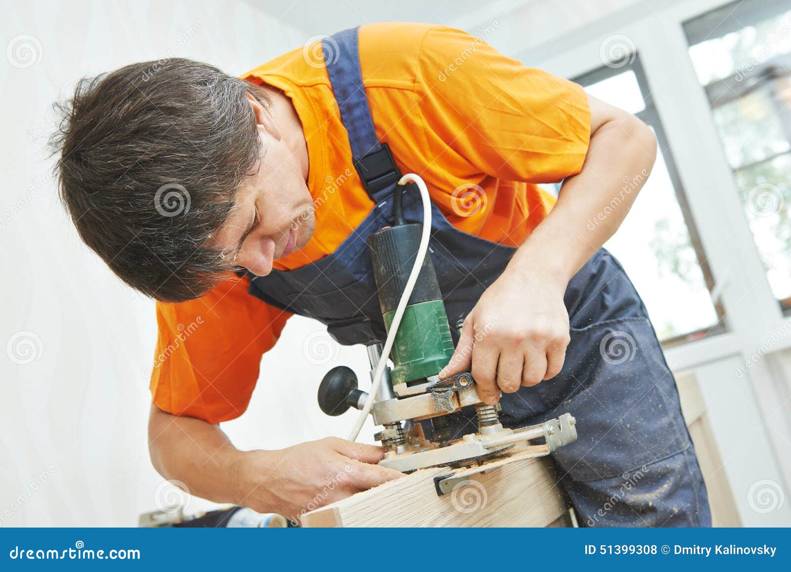 Door installer at work stock photo. Image of industry - 51399308