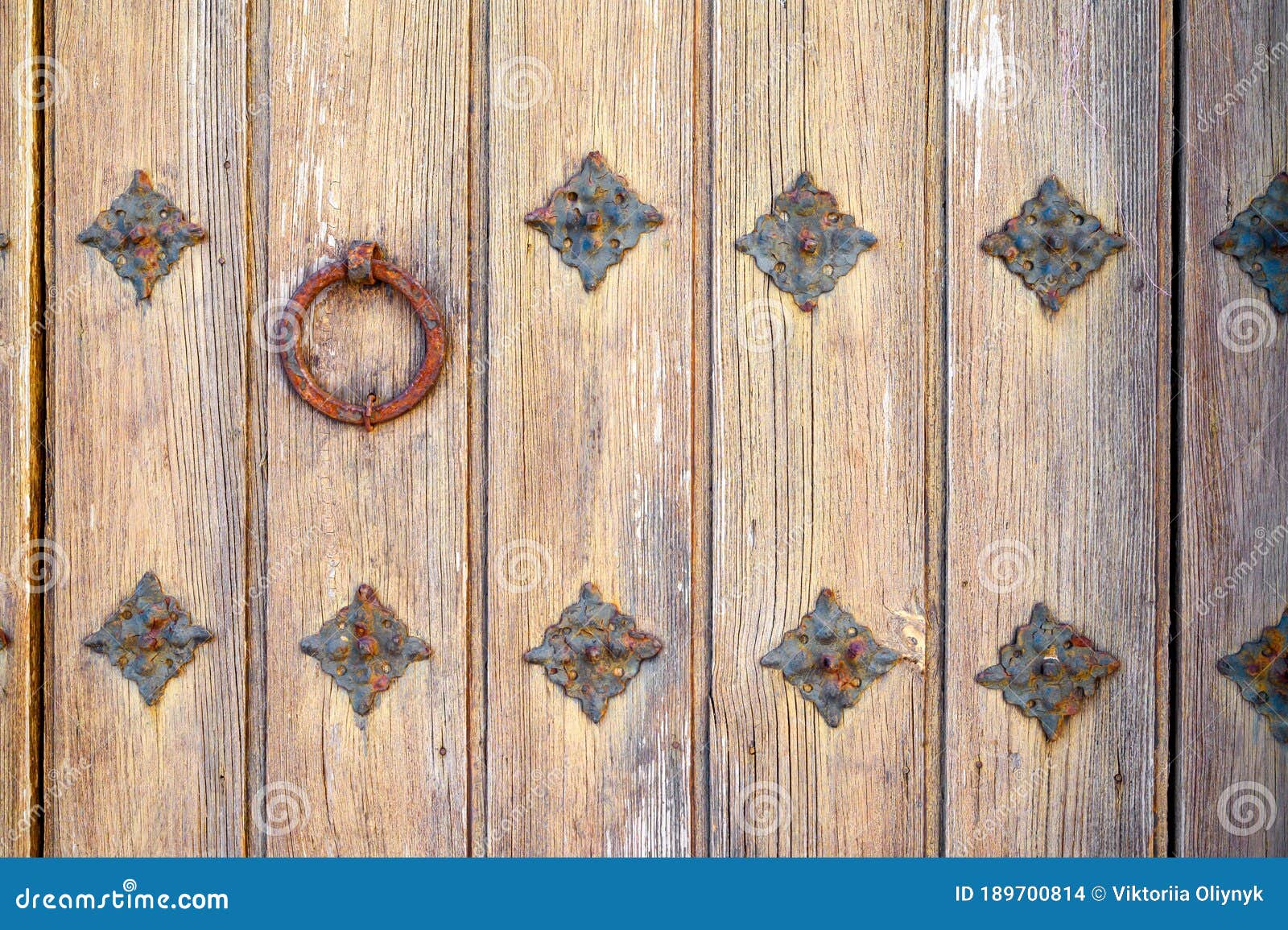 Door with an Iron Round Handle and Rivets Stock Photo - Image of brown ...