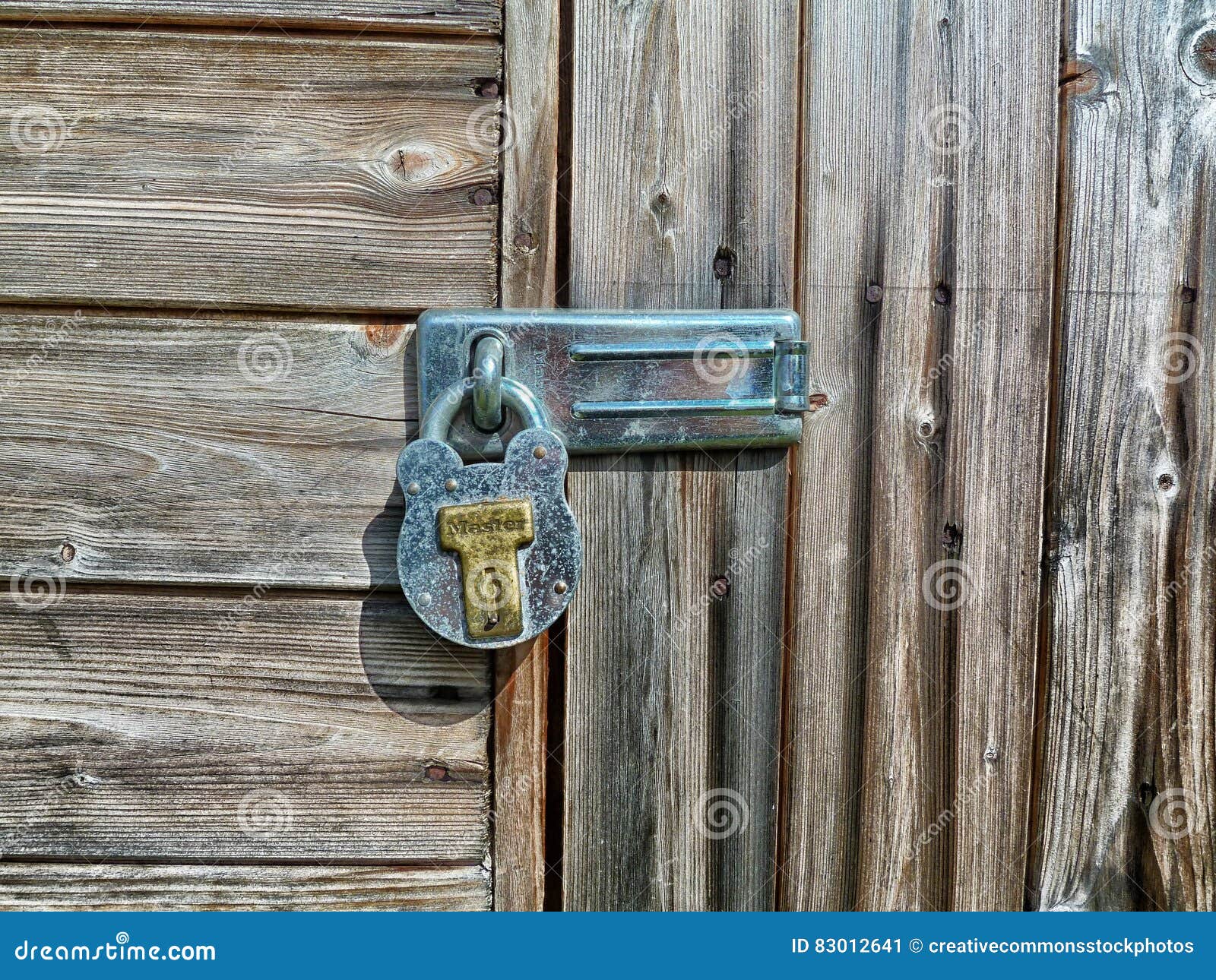 Door With Padlock Picture. Image: 83012641