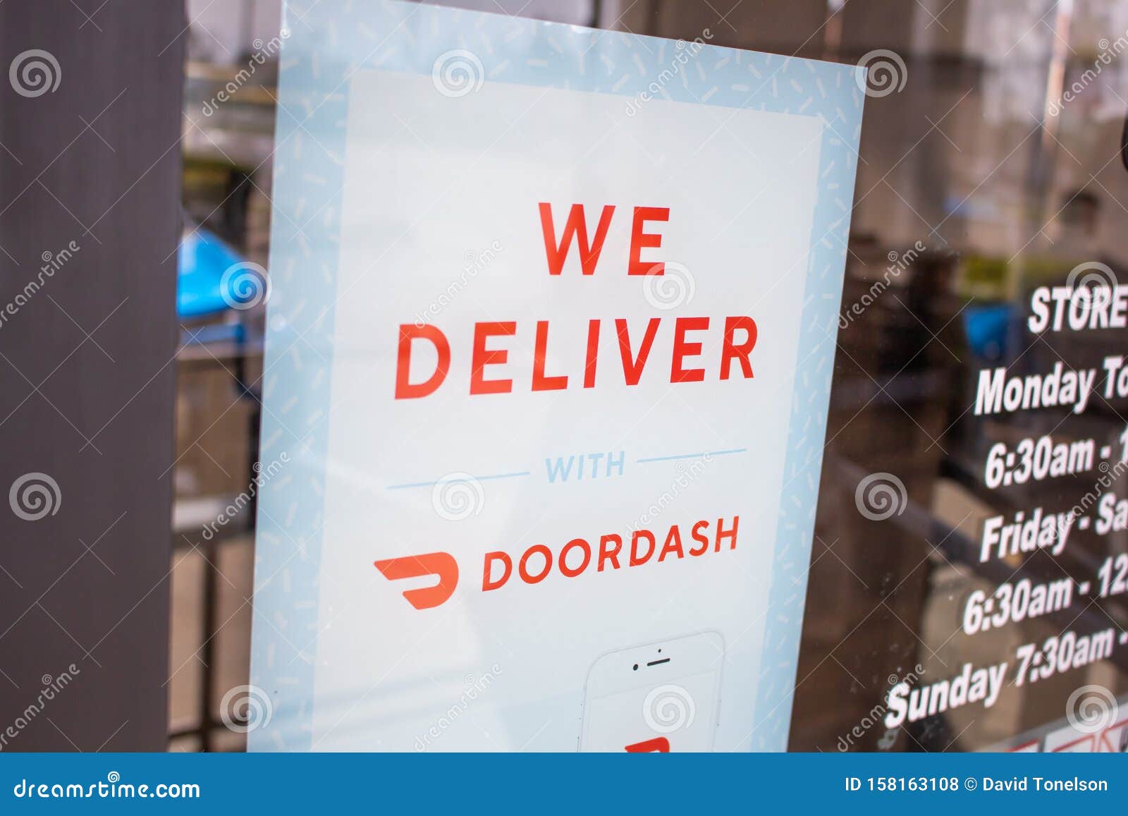 DoorDash sign in window editorial stock photo. Image of jobs - 158163108