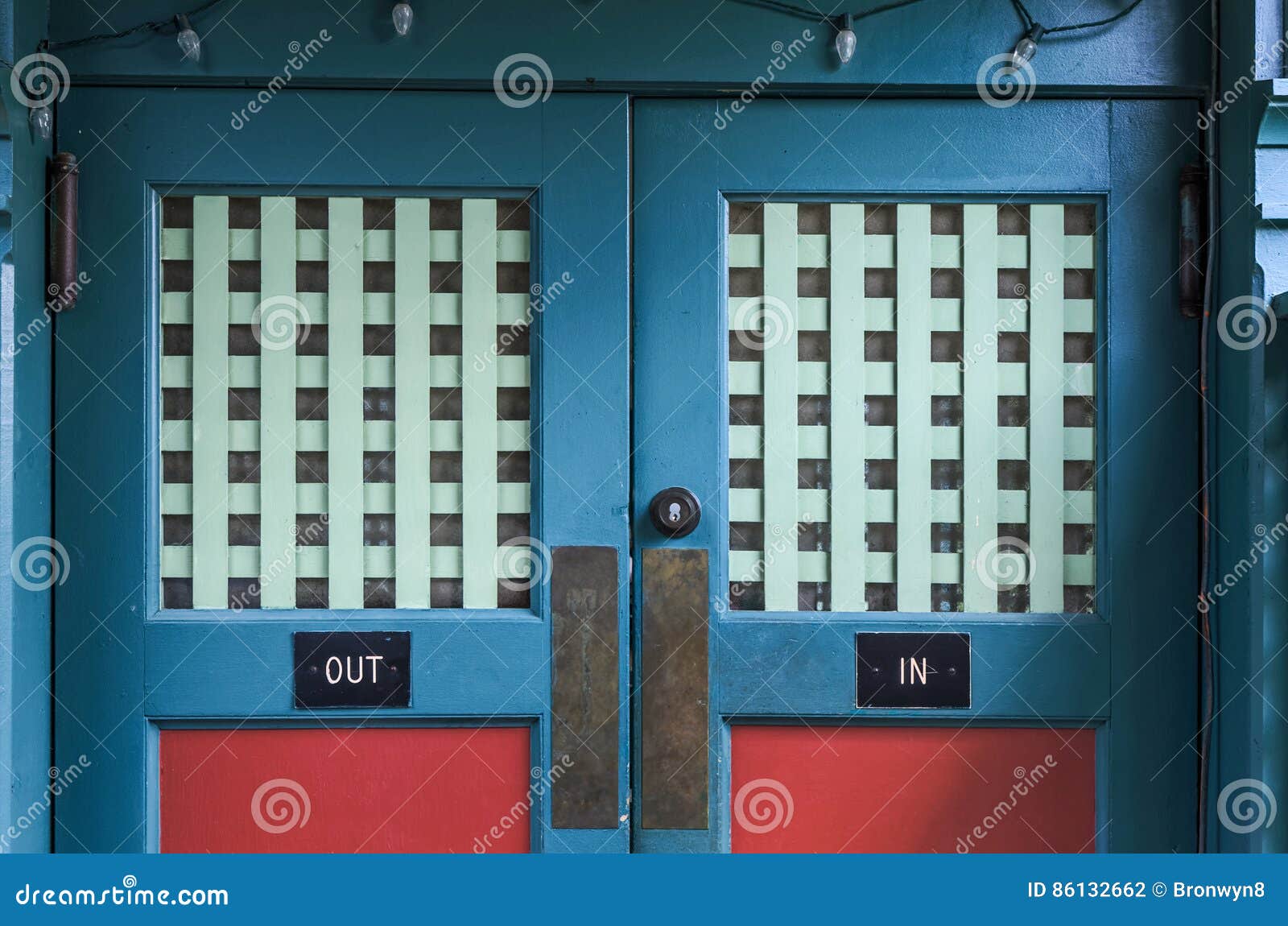 Doors Marked in and Out stock photo. Image of building - 86132662